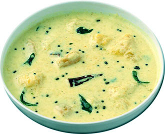 Kaalan, Kerala Recipe made with Yogurt, Coconut and Raw Banana